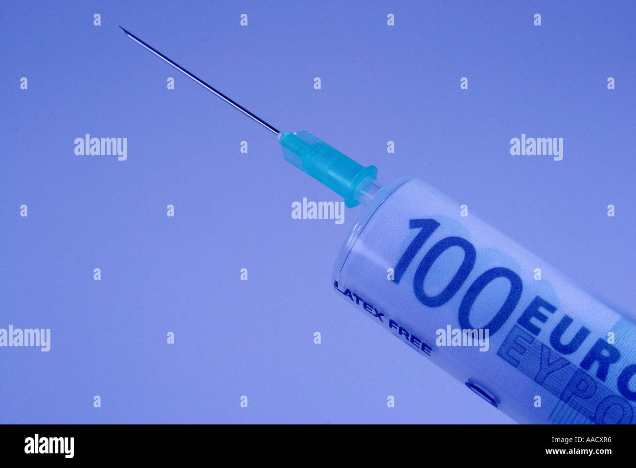 Symbol money syringe Stock Photo - Alamy