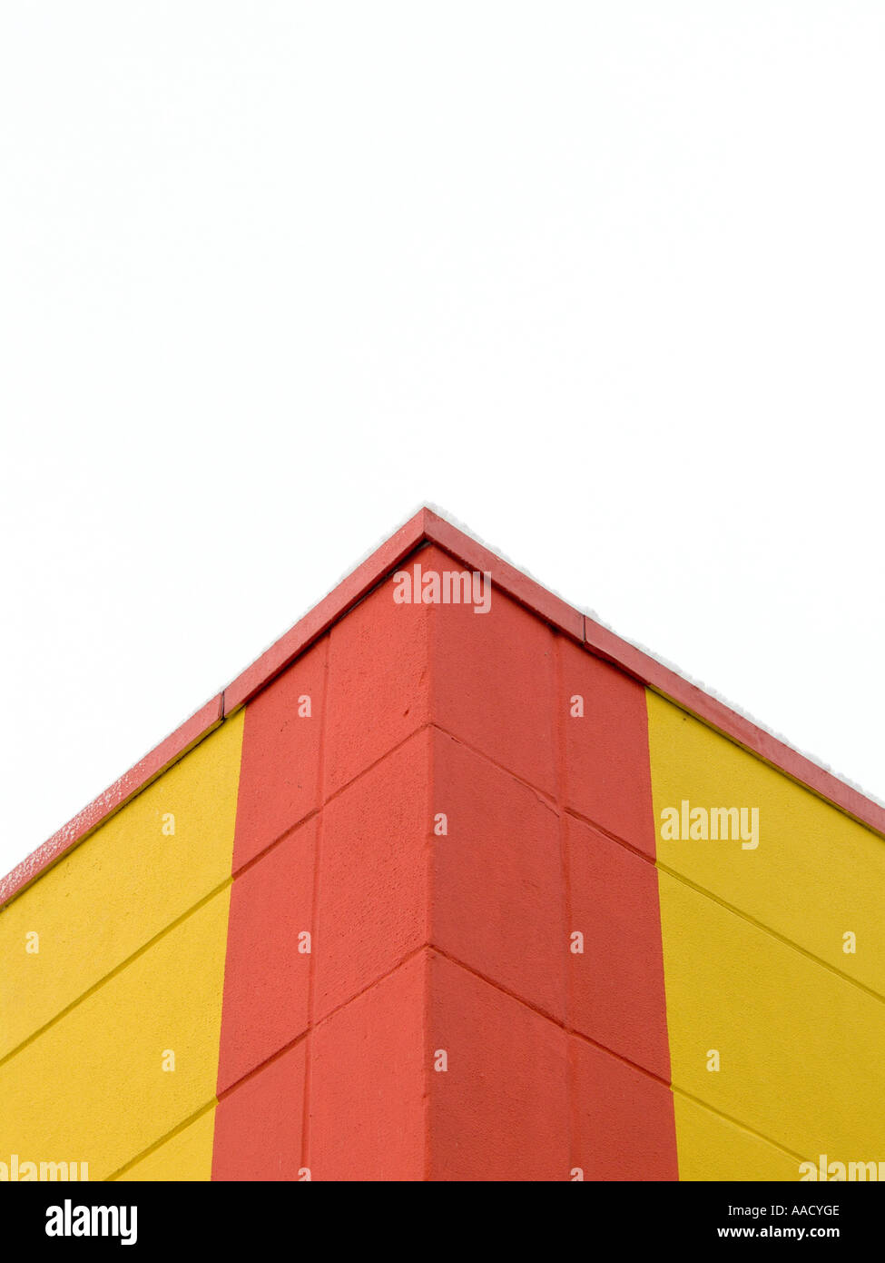 Building detail painted in red and yellow Stock Photo - Alamy