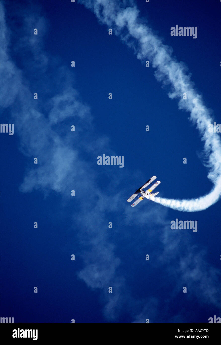 A De Havilland Tiger Moth aircraft in flight during an air display ...