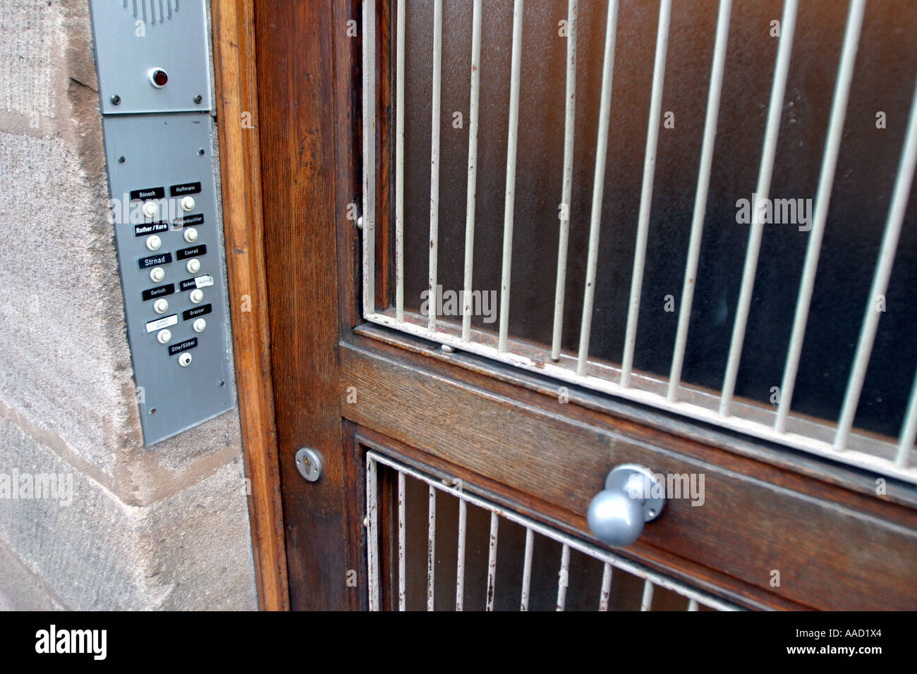entrance door with bell signs Stock Photo - Alamy