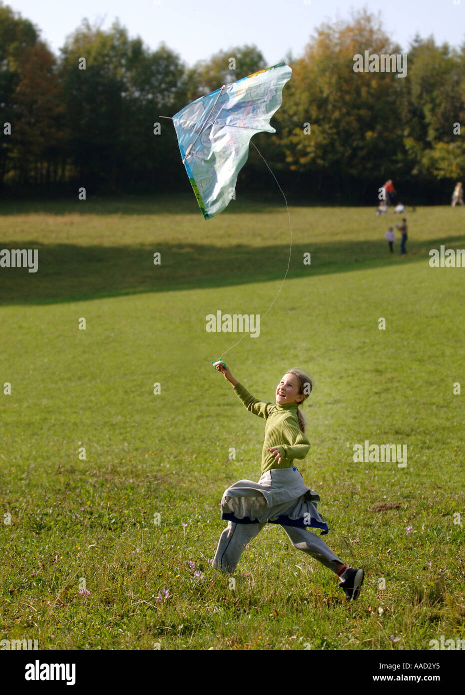 children are flying a kite Stock Photo - Alamy