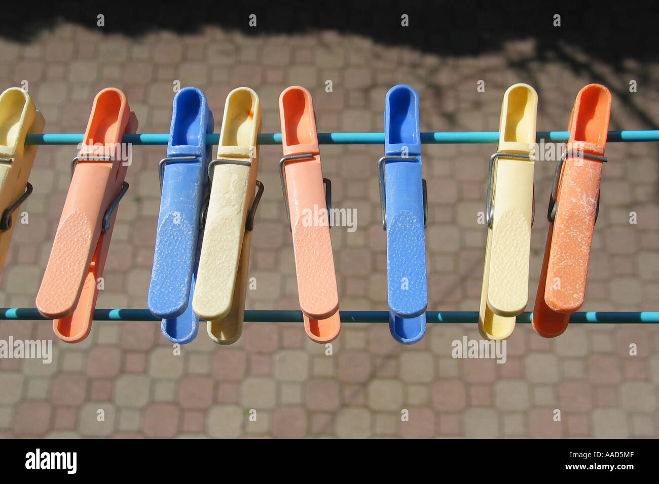 Pegs on Washing Line Stock Photo - Alamy