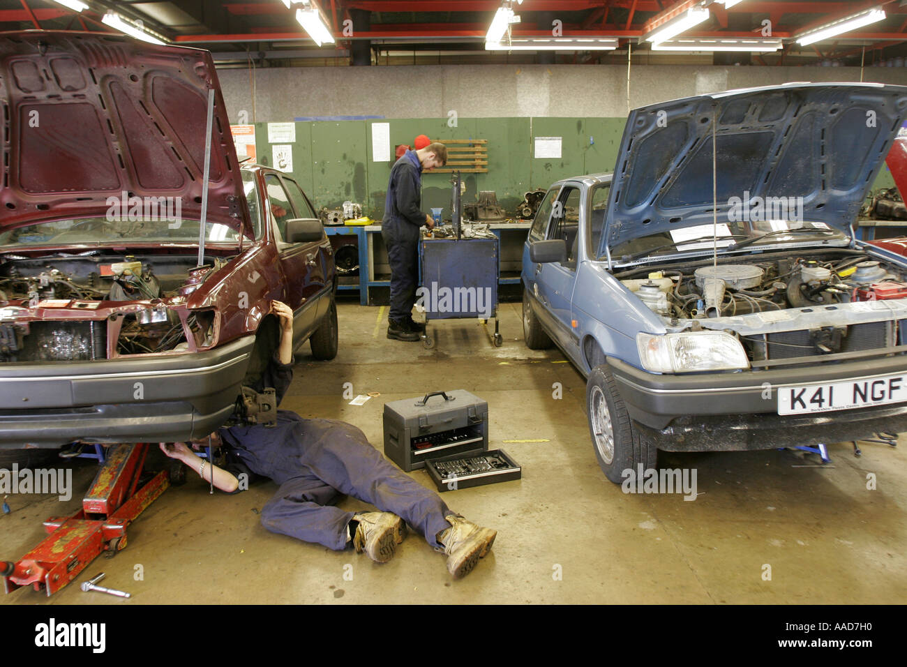 Two male students in Car mechanics course at sixth form college Stock ...