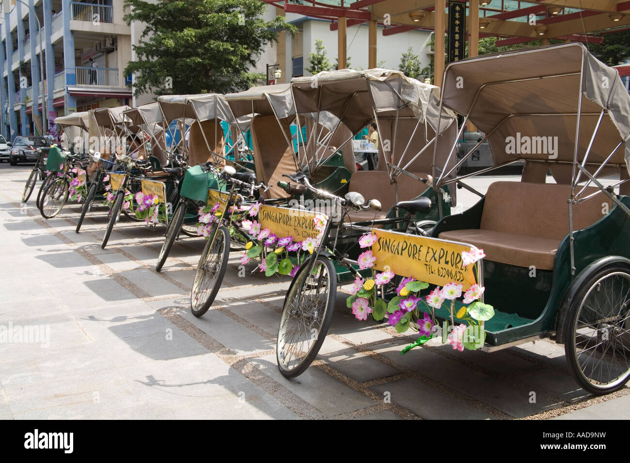 SINGAPORE ASIA May A row of rickshaws waiting for passengers in ...