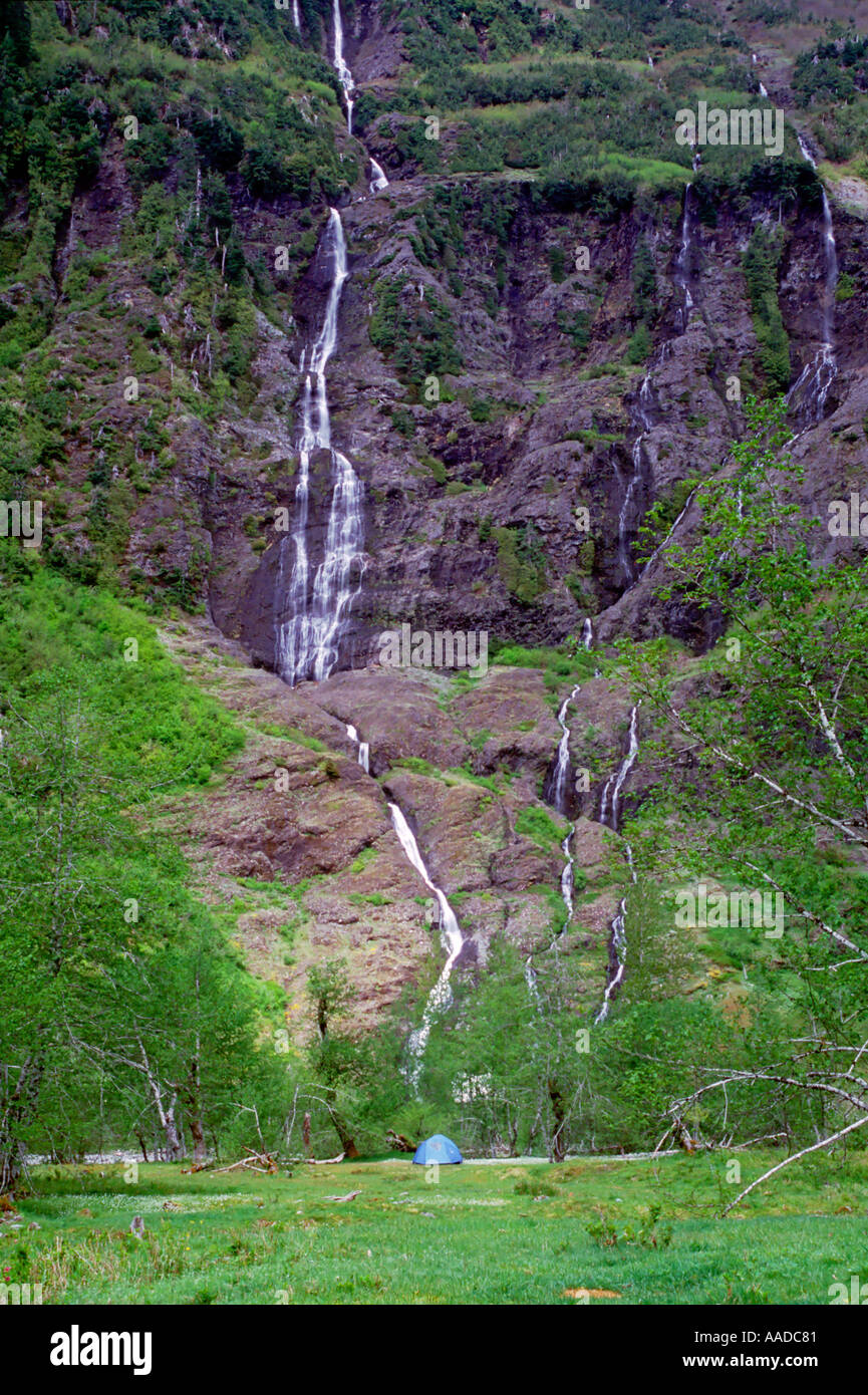 Waterfall above tent in Enchanted Valley Stock Photo - Alamy
