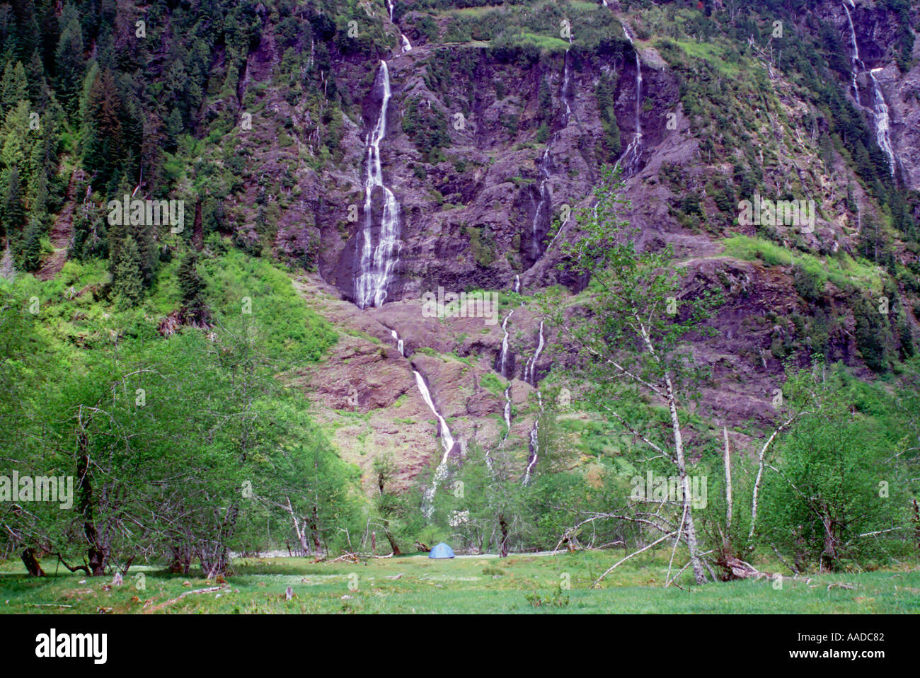 Waterfall above tent in Enchanted Valley Stock Photo - Alamy