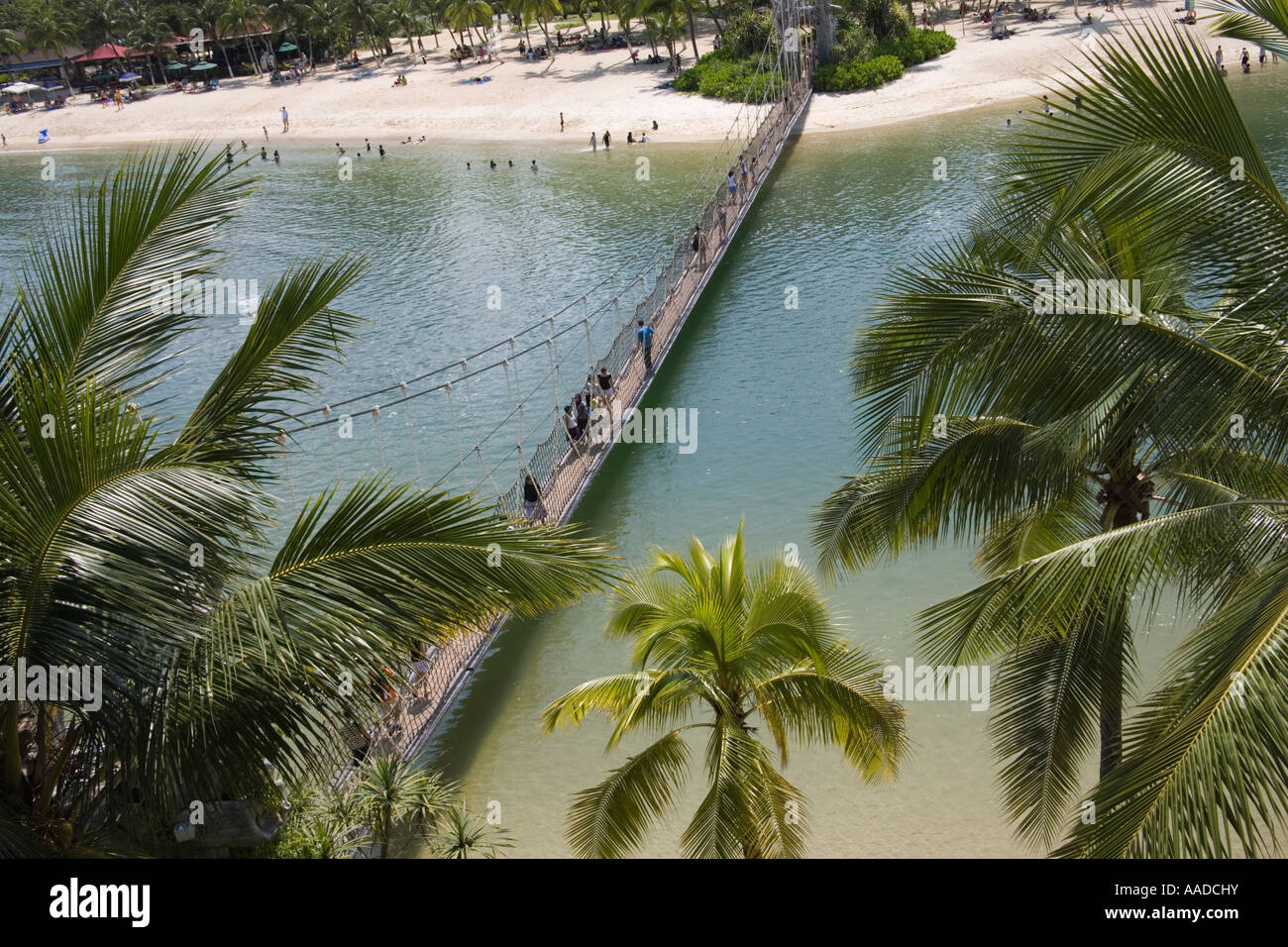The suspension bridge linking palawan beach in sentosa hi-res stock ...