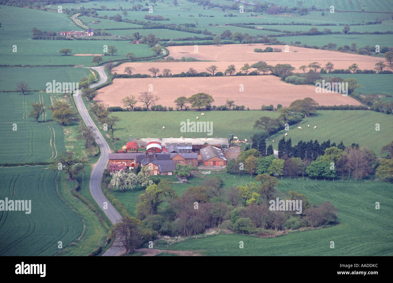 Aerial view of agriculture from above looking down on farm buildings ...