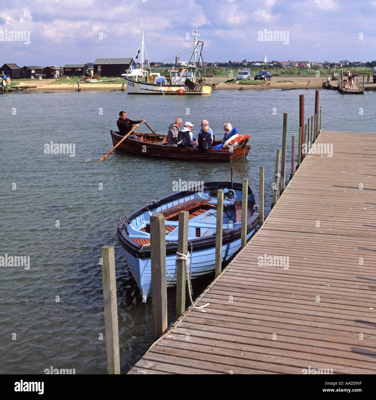 Walberswick & Southwold lighthouse distant ferry man & boat rowing ...