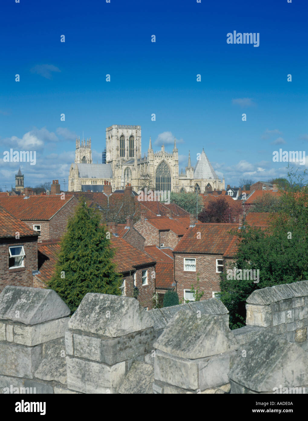 Picturesque east facade of medieval York Minster seen over roof tops ...