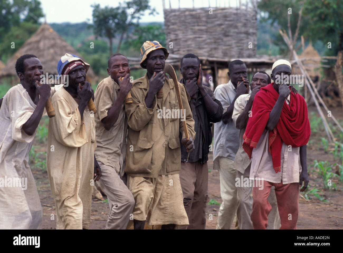 Dinka men from Sudan at a refugee camp near Asosa Eritrea singing ...