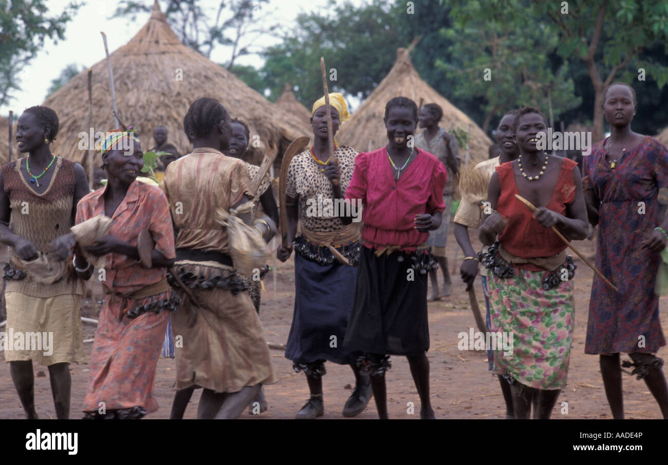 Dinka women Sudanese refugee women dancing through a refugee camp near ...