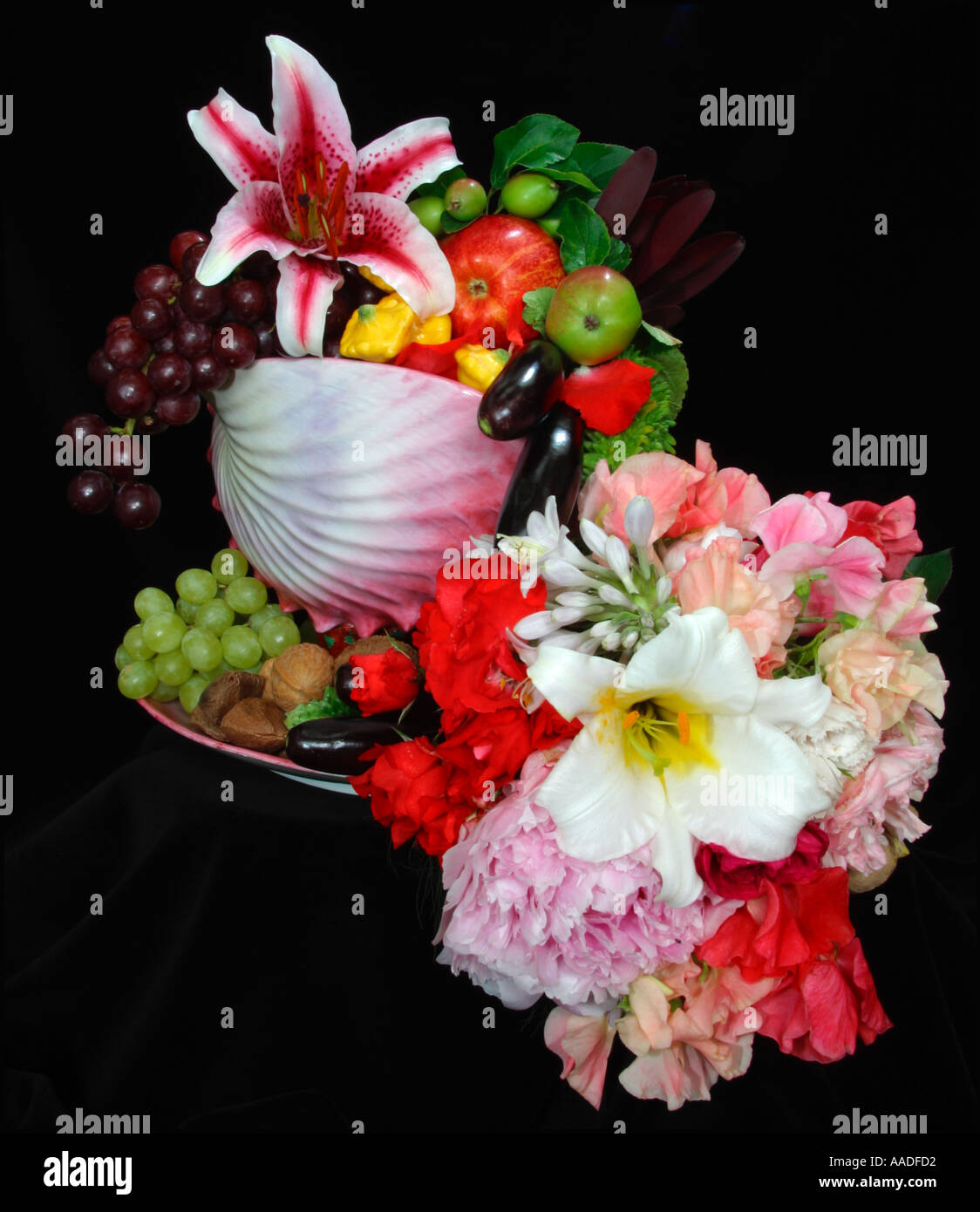 Cornucopia of summer riches. Fruits and flowers in abundance Stock ...
