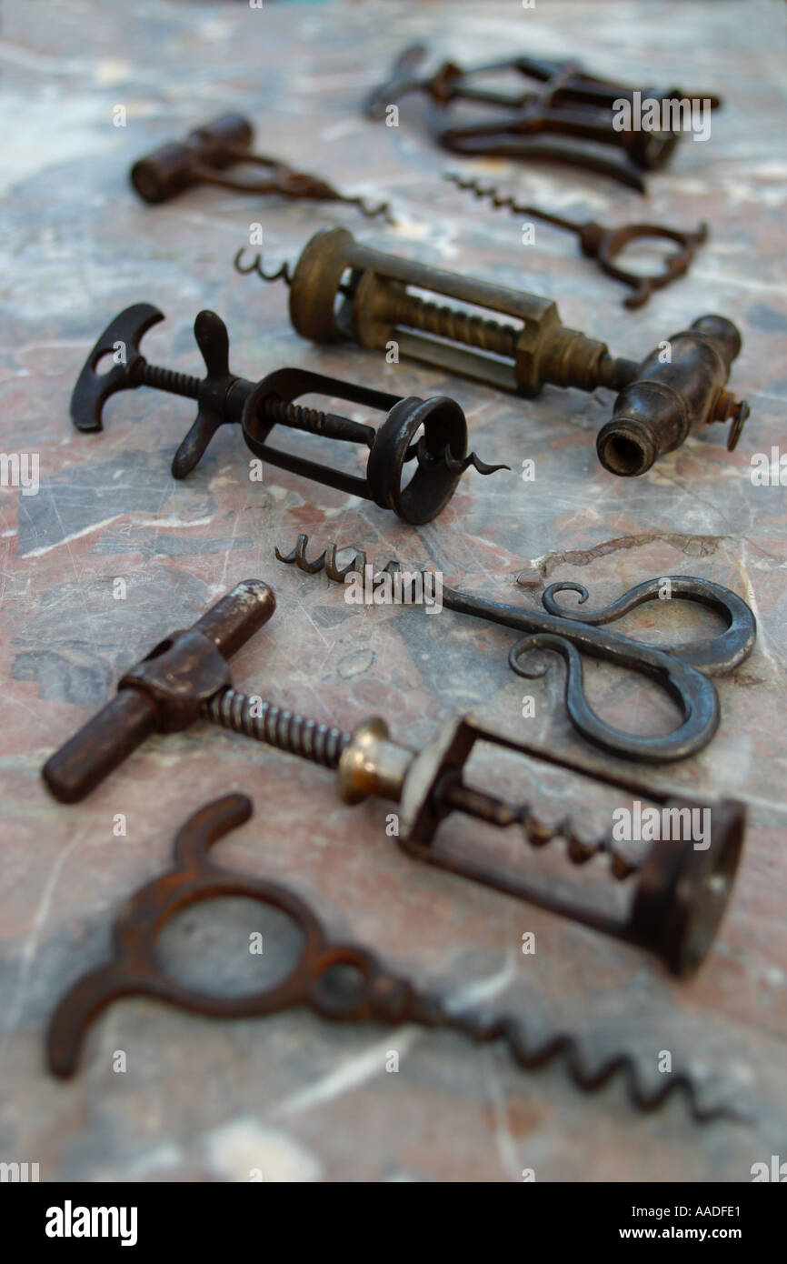 Antique corkscrews laid on marble slab to show designs Stock Photo - Alamy