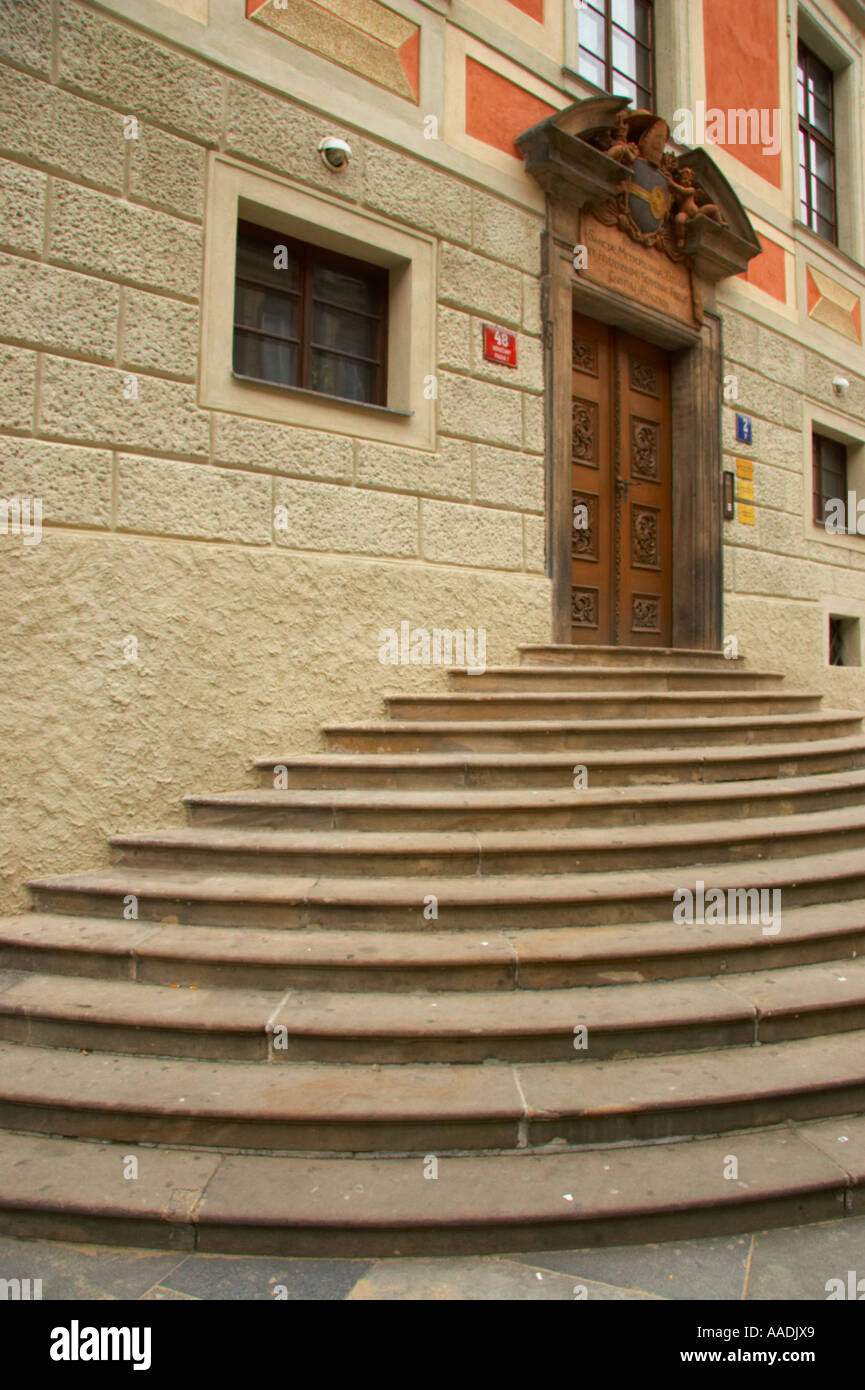 Czech Republic, Prague, Prague Castle. A rustic door and steps on a ...