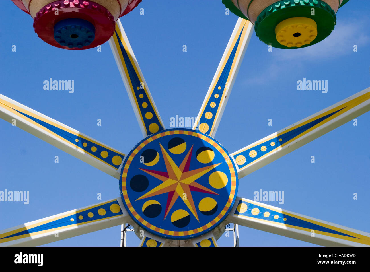 Radiating arms of fairground ride Stock Photo - Alamy