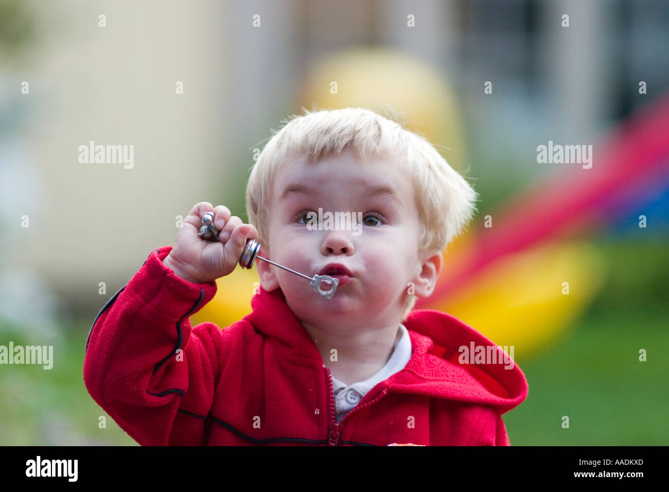 Child blond boy blowing hi-res stock photography and images - Alamy