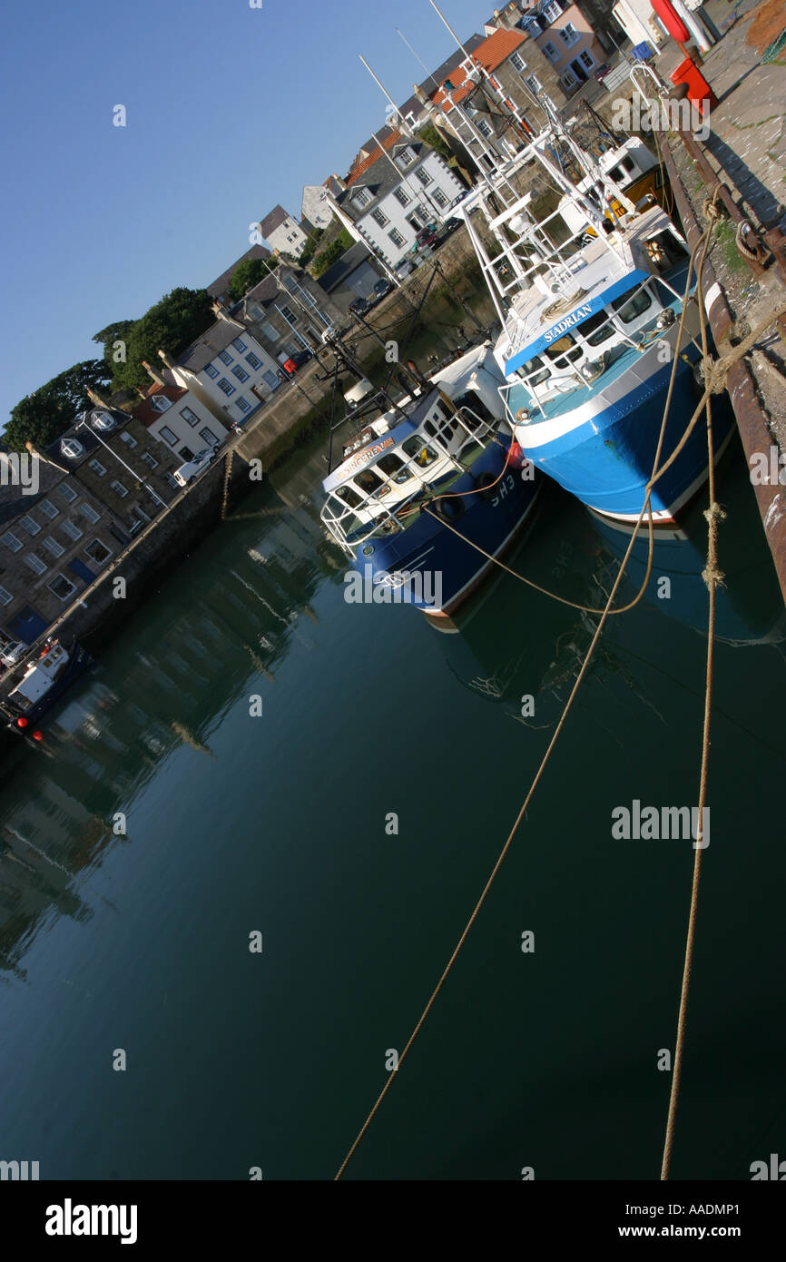View of fishing harbour scene with two (2) boats, Fife, Scotland, UK ...