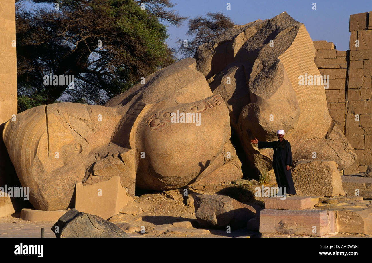 Giant statue of Ramses II lying on the ground in the Ramesseum in ...