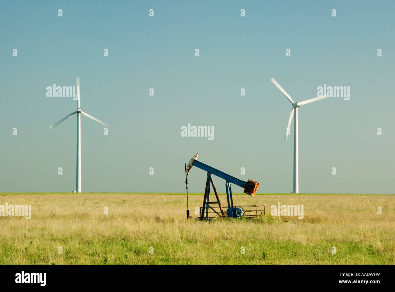 power generating windmills alongside oil wells in the Texas Panhandle ...