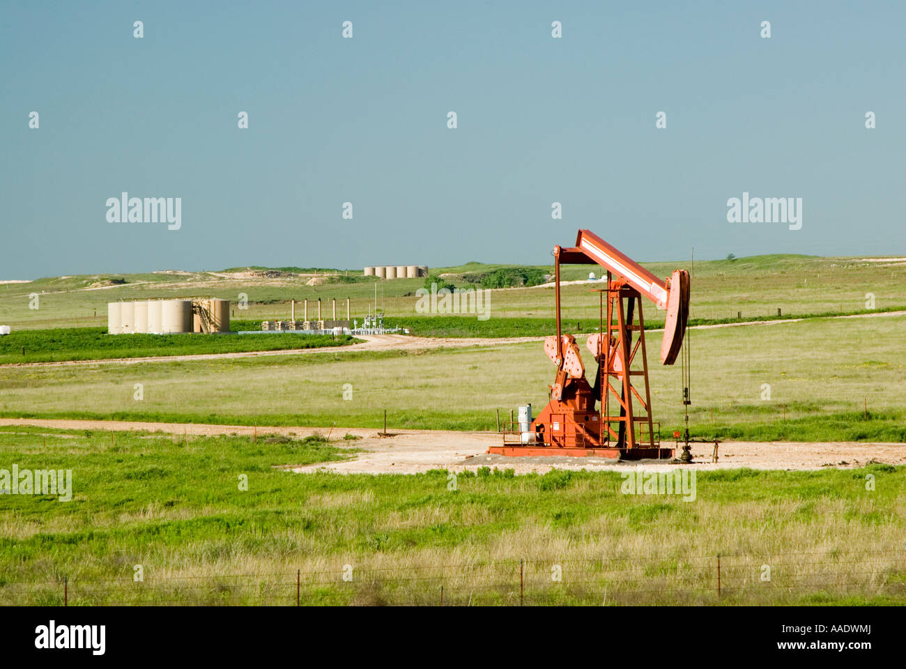 a producing oil well in the Texas panhandle crude oil storage tanks in ...