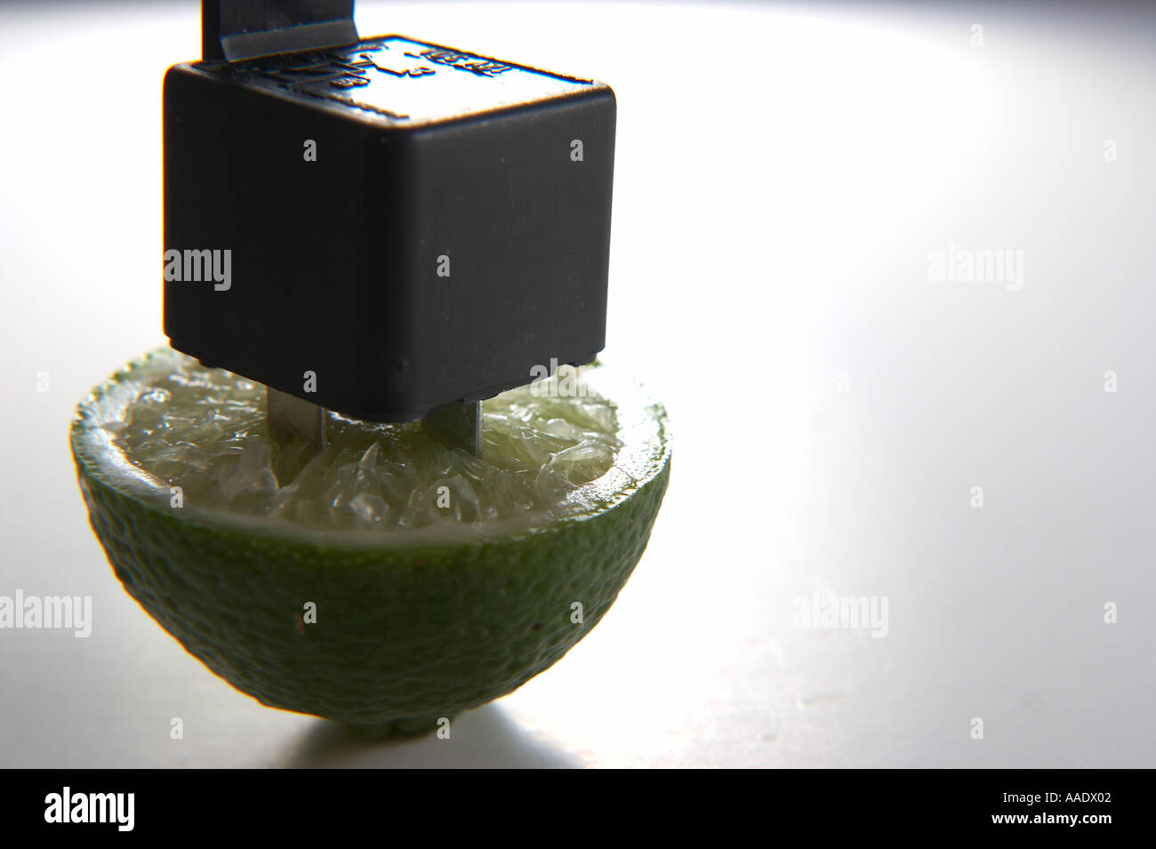 Electric relay connected to a lime Stock Photo - Alamy