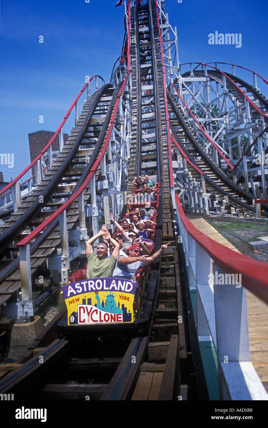 Riders on a roller coaster Stock Photo - Alamy