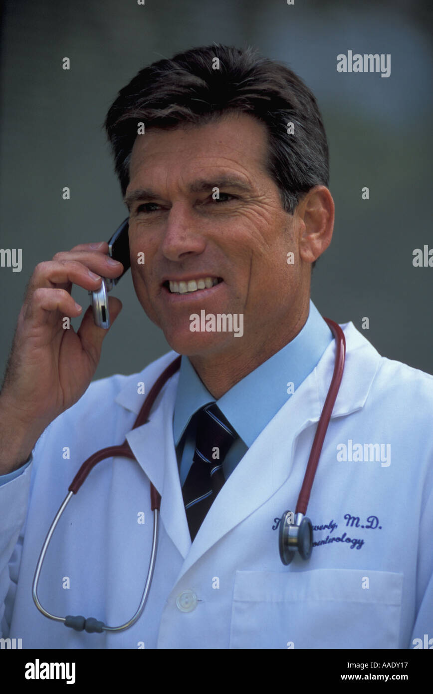 Medical doctor in lab coat wearing stethoscope Stock Photo - Alamy