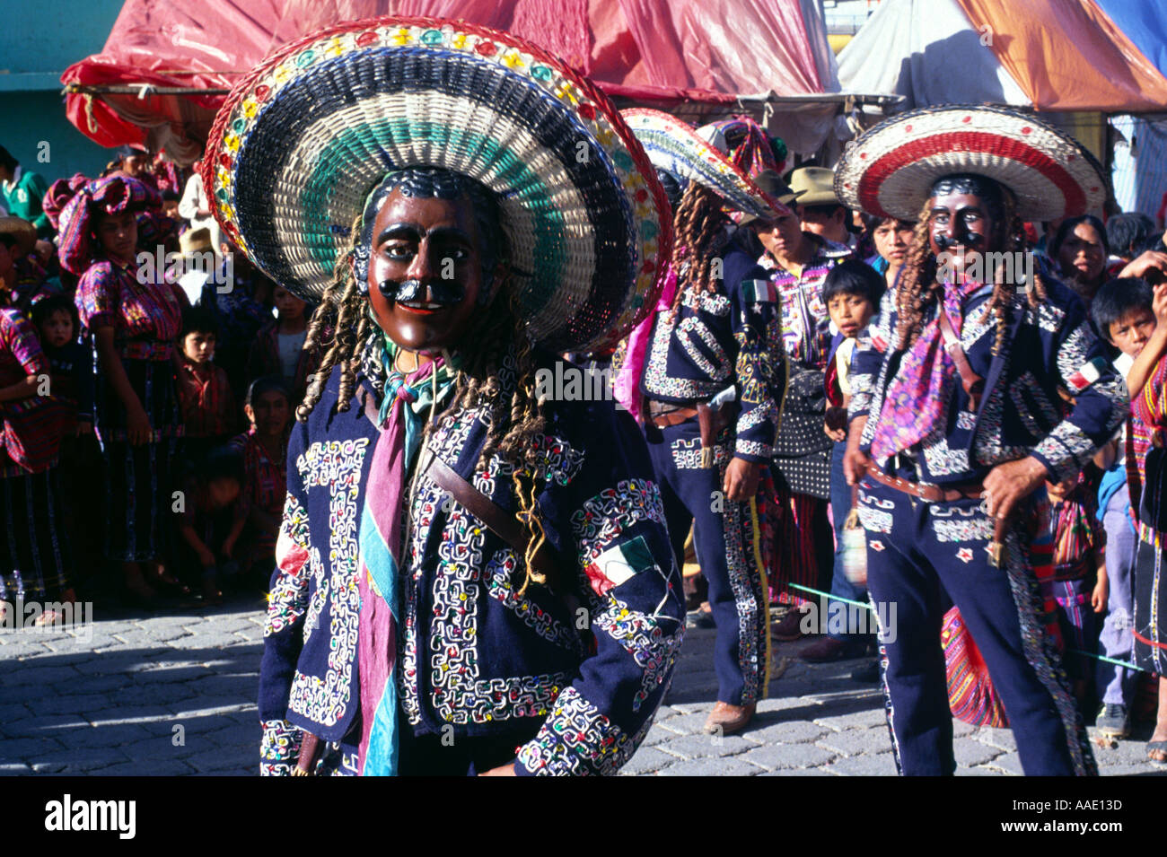 Dancers re enacting the arrival of the Spanish Solola fiesta Mayan ...
