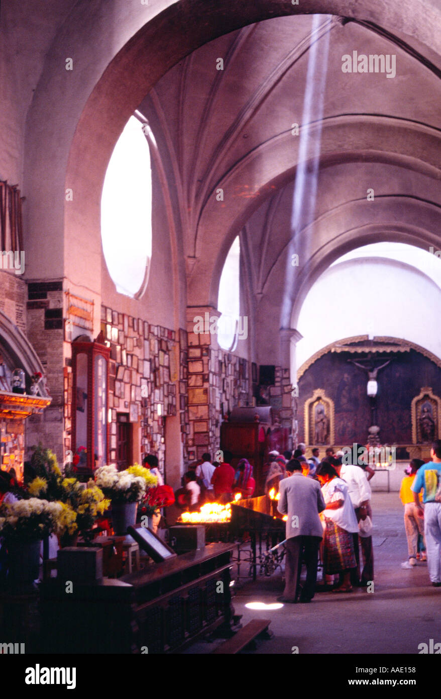 Antigua Guatemala Roman catholic church interior with people praying ...