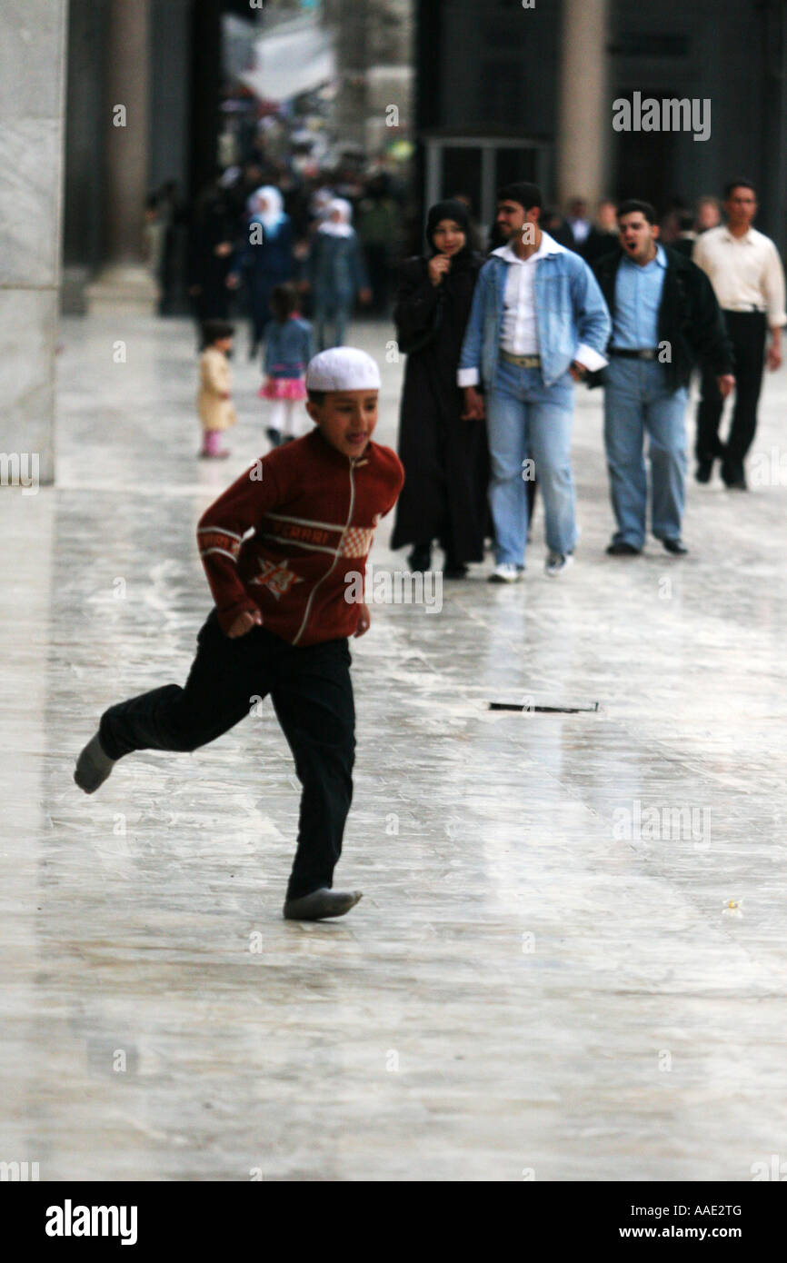 Boy running through The Umayyad Great Mosque, Old Town Damascus, Syria ...