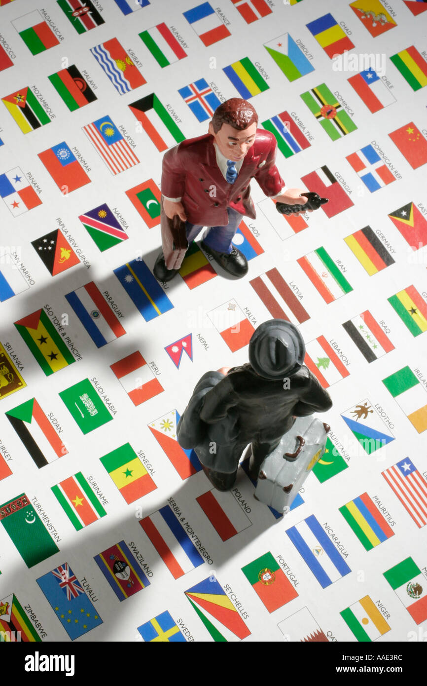Businessmen Figures and World Flags Stock Photo - Alamy