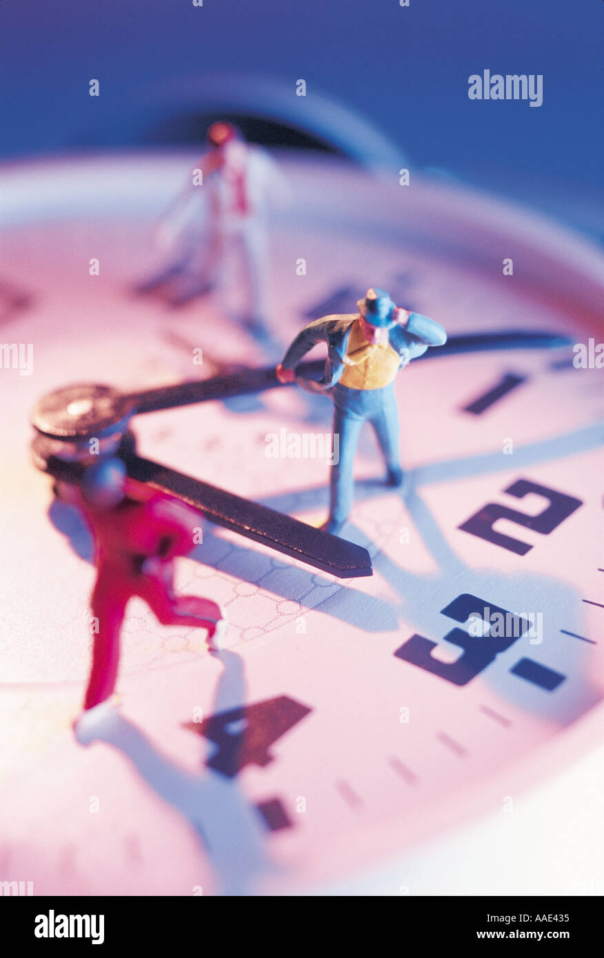 Miniatures Figures on Clock Stock Photo - Alamy