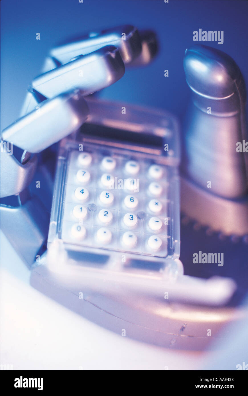 Robotic Hand Holding Calculator Stock Photo - Alamy