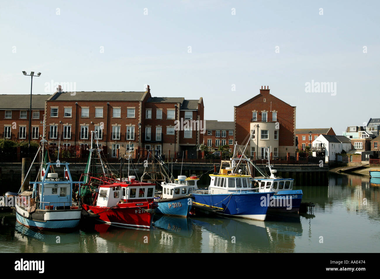 Fishing Boats in harbour Stock Photo - Alamy
