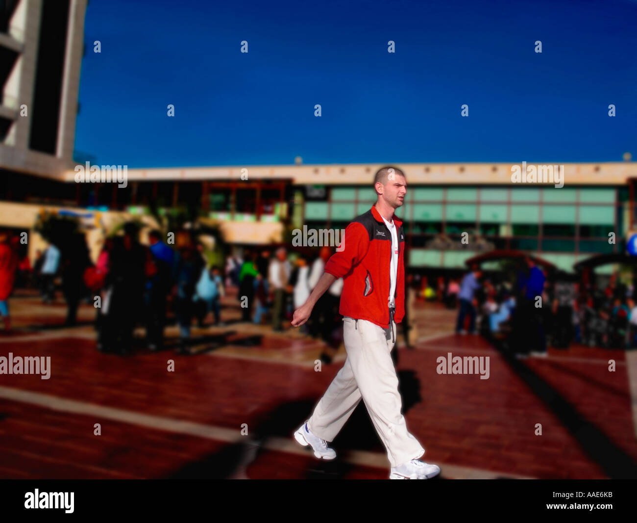 Guy walking on promenade hi-res stock photography and images - Alamy