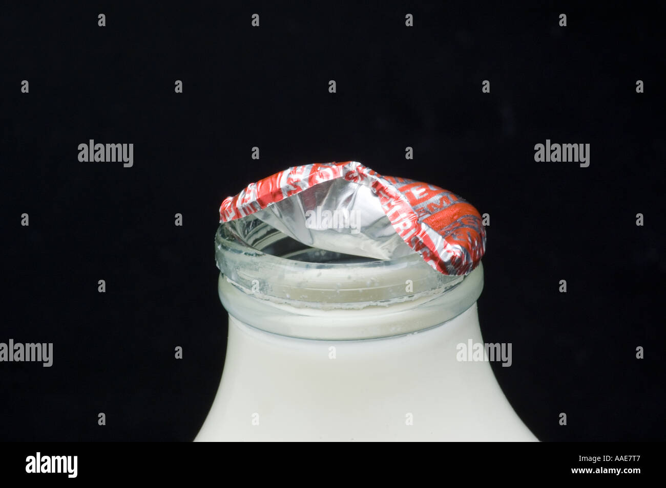 Milk bottle top Stock Photo - Alamy