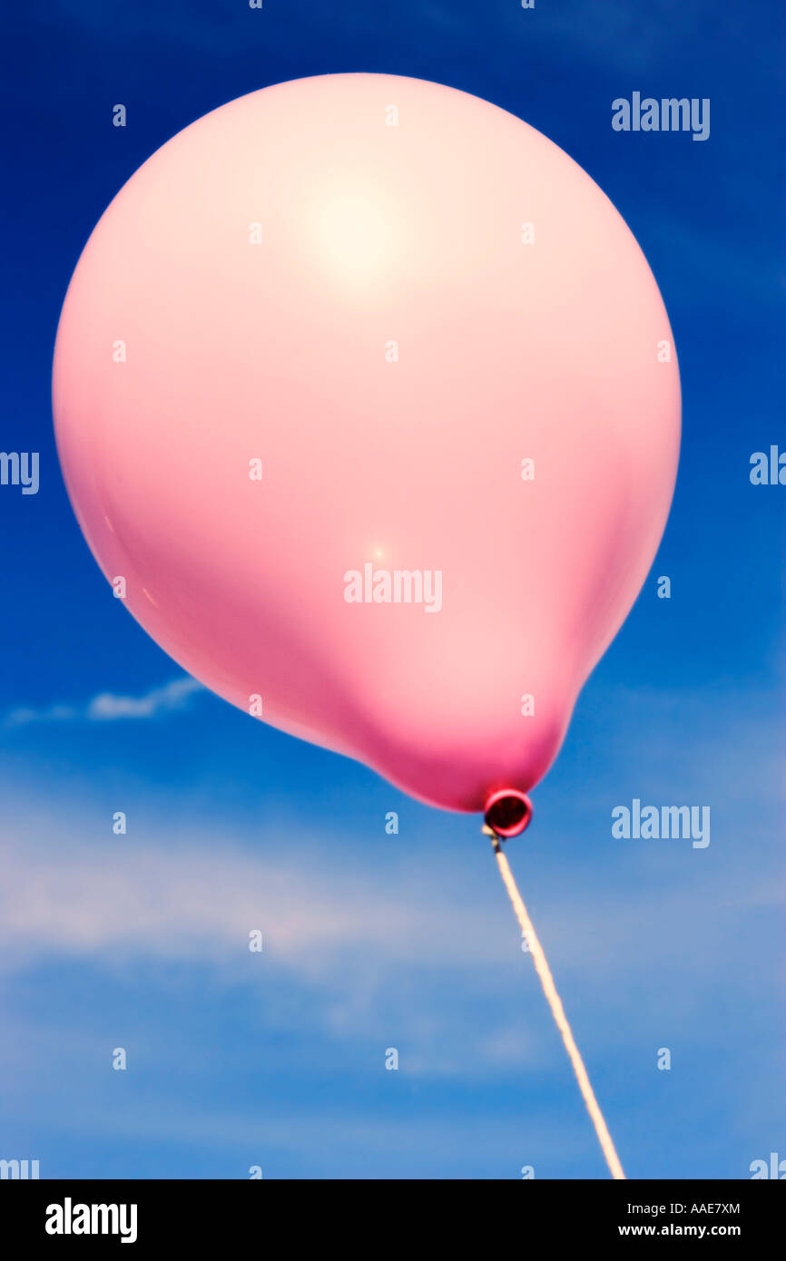 Single pink balloon Stock Photo - Alamy