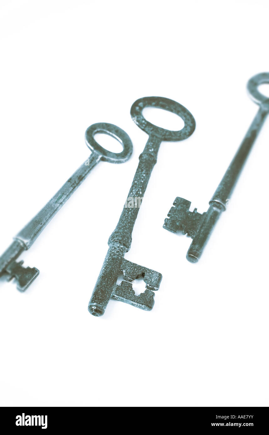 Three keys shot on a white background Stock Photo - Alamy