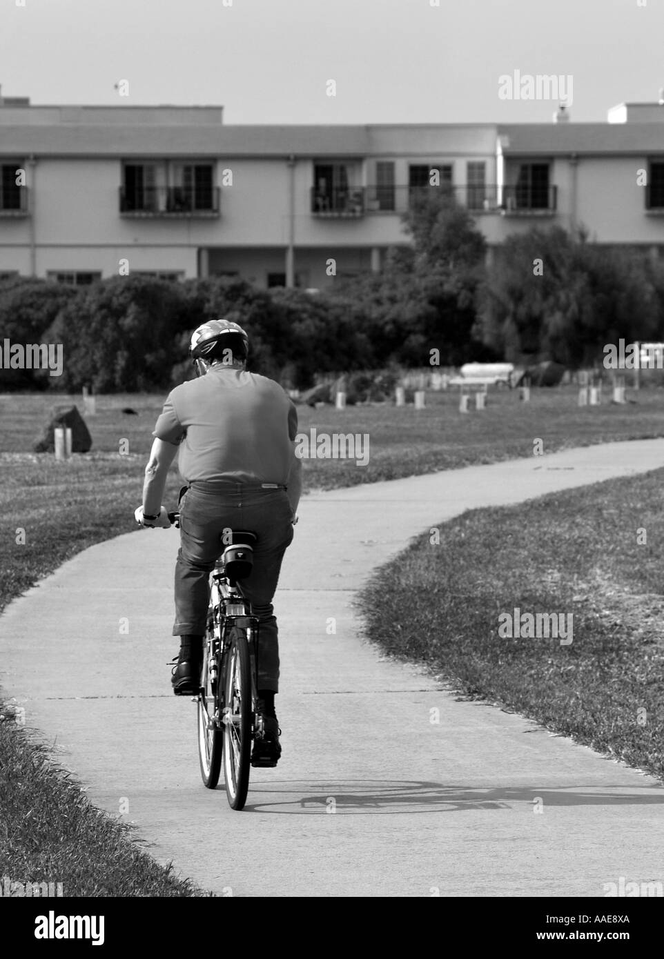 Man riding old bike Black and White Stock Photos & Images - Alamy