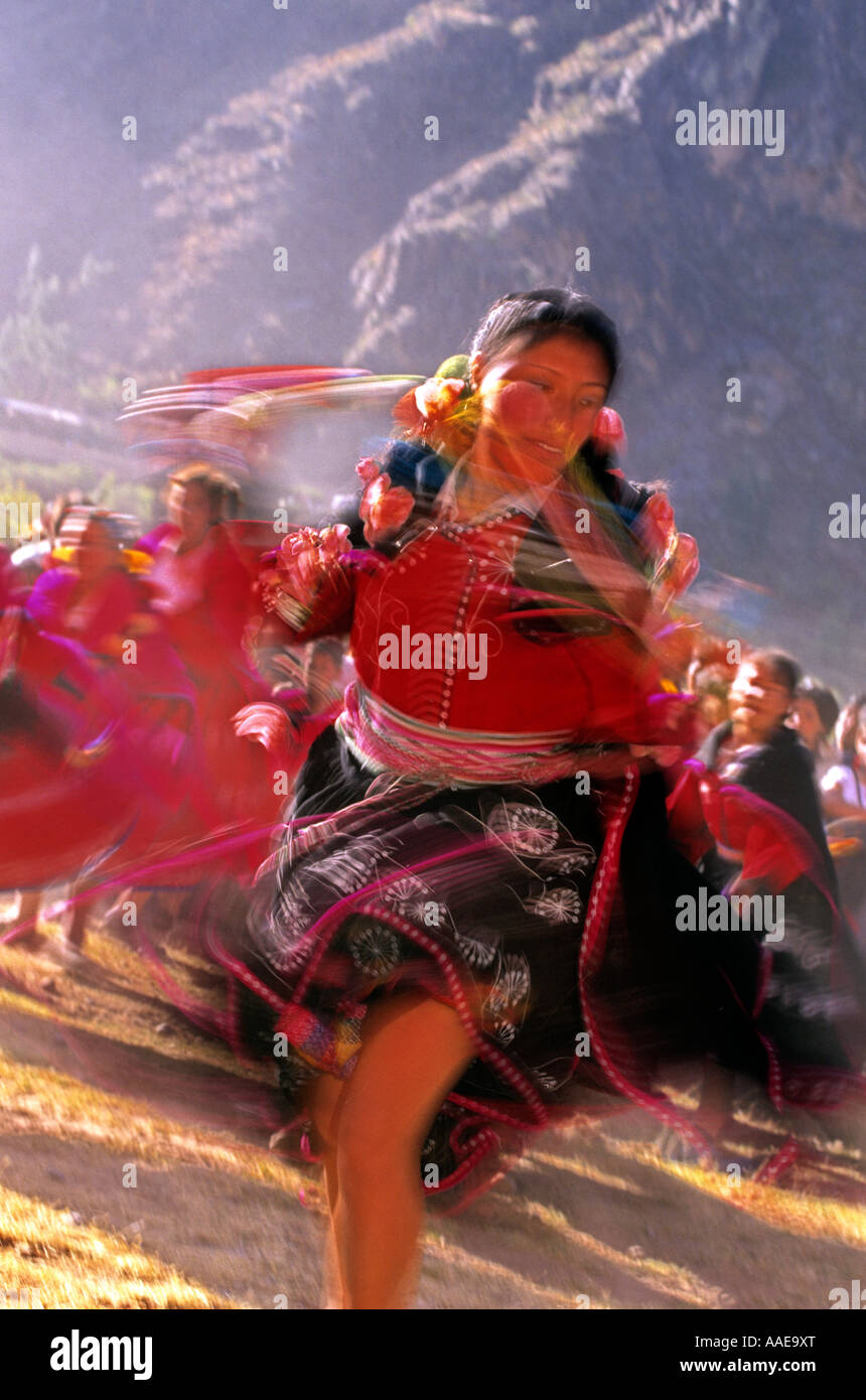 Dancers performing at the Fiesta de Pentecostes in the Incan village of ...