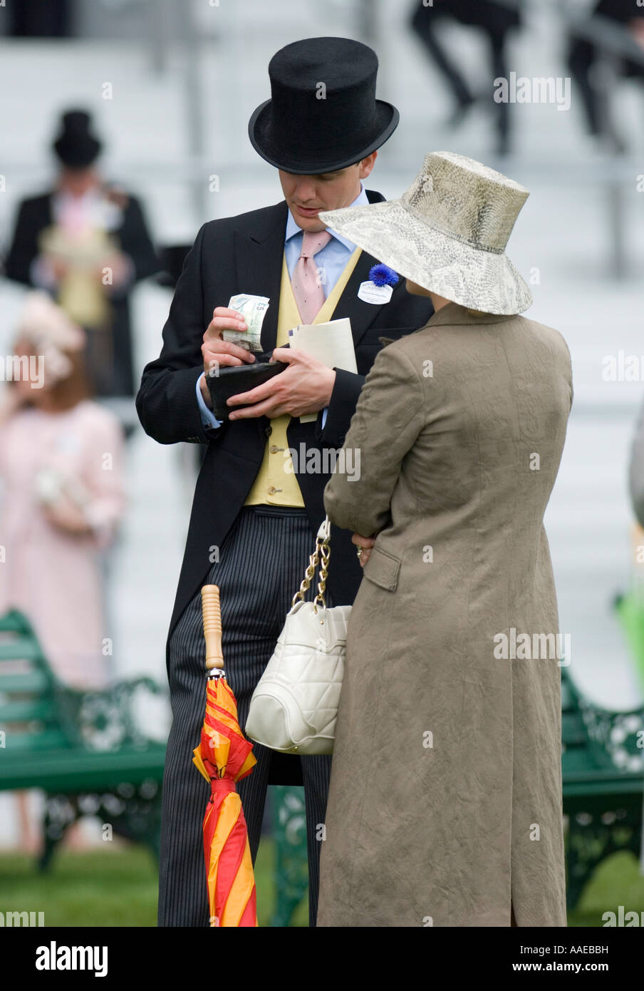 Gentleman and woman in formal attire at Royal Ascot Stock Photo - Alamy
