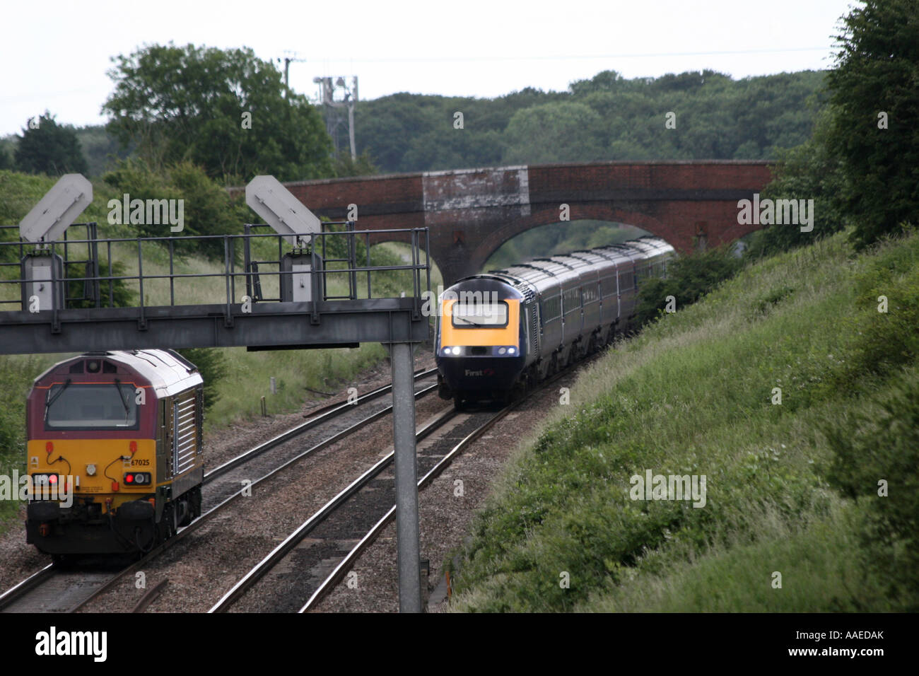First Great Western High Speed Passenger Train passes EWS Diesel ...