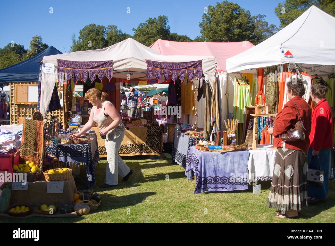 Shoppers at a Market Stall Stock Photo - Alamy