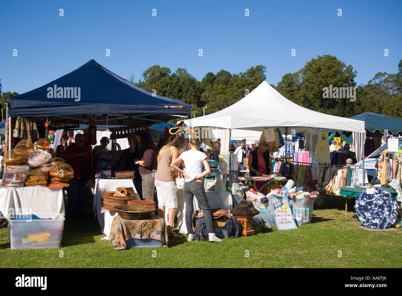 Shoppers at a Market Stall Stock Photo - Alamy