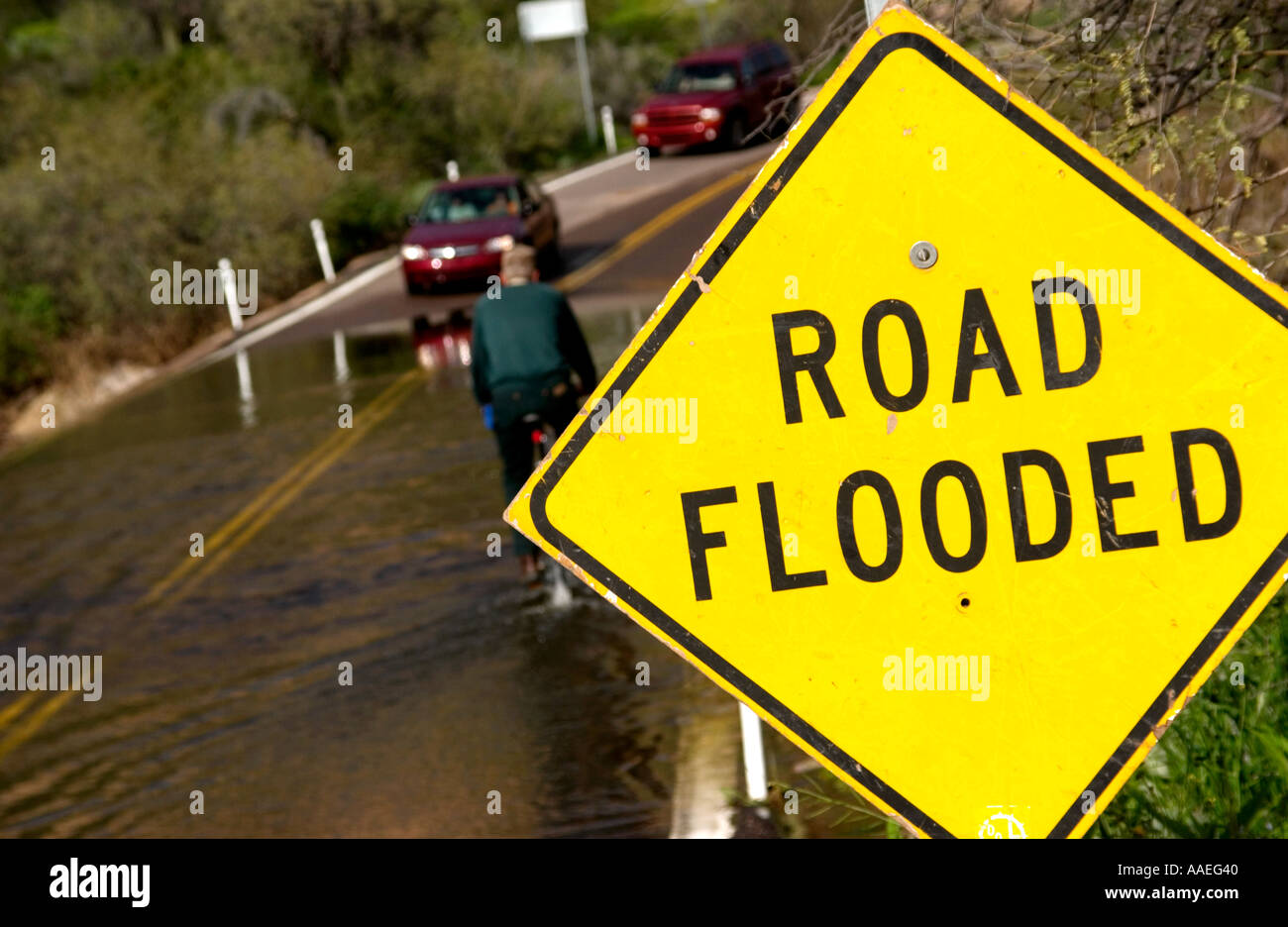 Riding on flooded street hi-res stock photography and images - Alamy