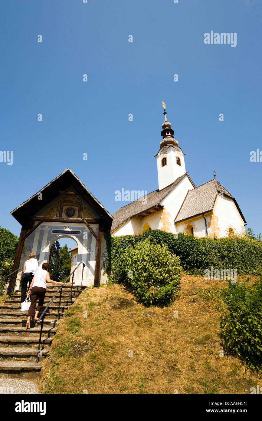 Two people on the way to the Rosary Curch Maria W rth Worthersee ...