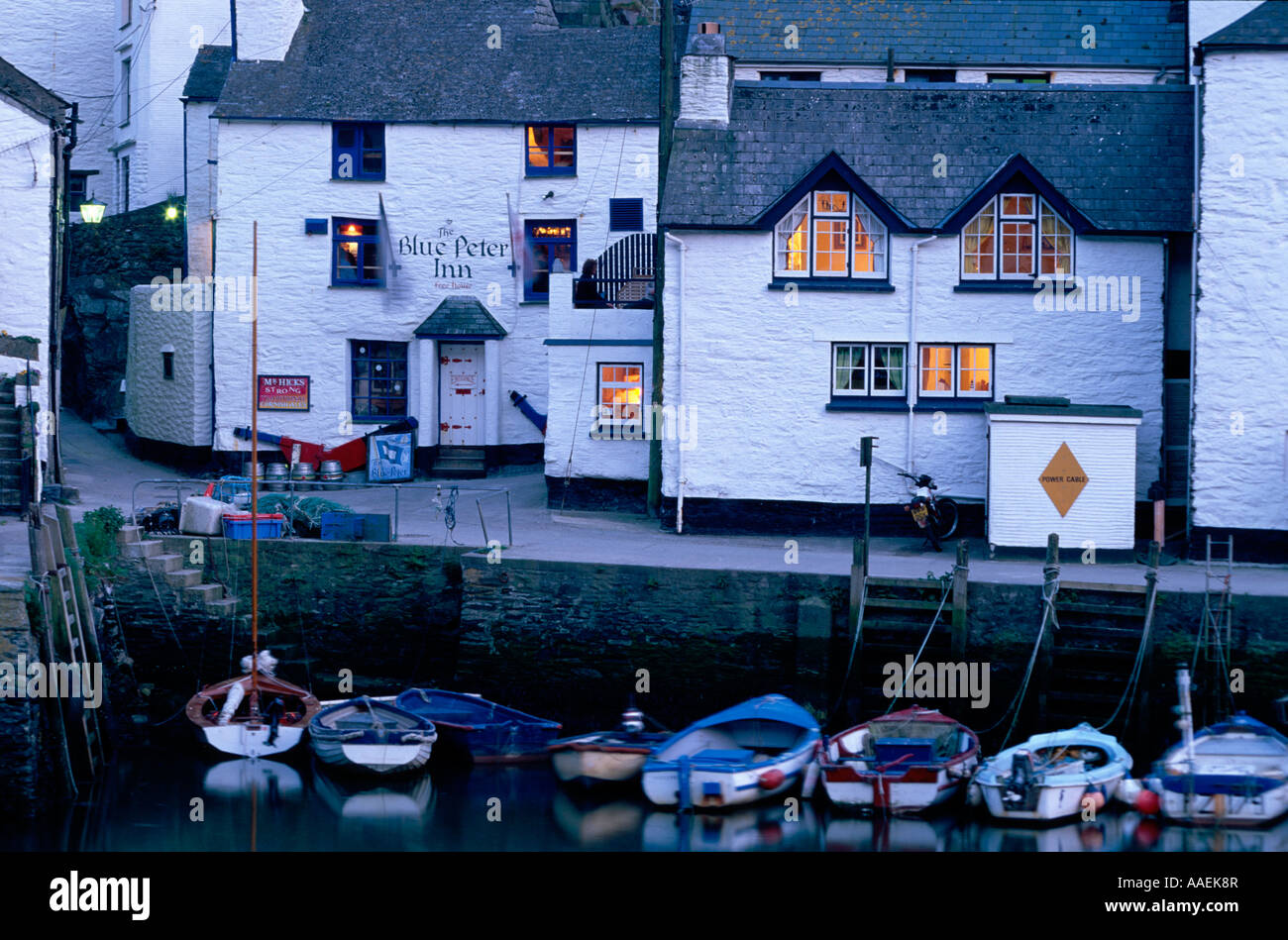 Blue Peter Inn Polperro Harbour at night Cornwall England Stock Photo ...