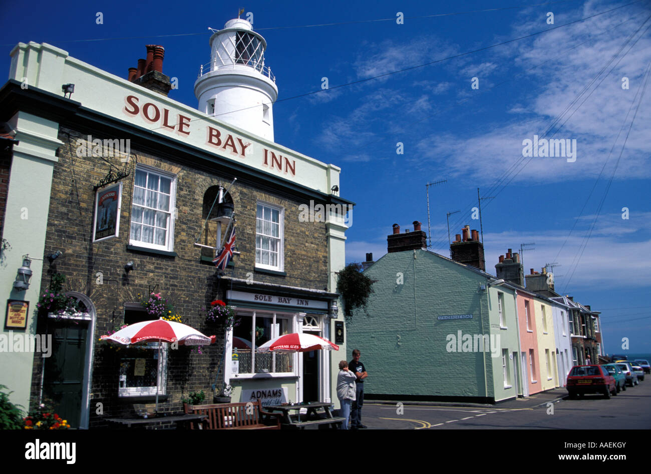 The Sole bay Inn Pub with Lighthouse in the back Southwold Suffolk ...