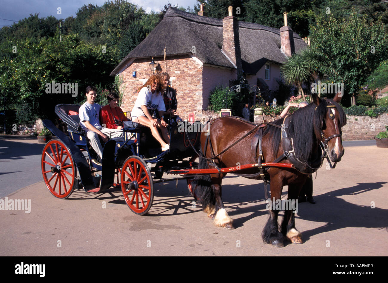 People in a horse drawn carriage Cockington Devon England United ...